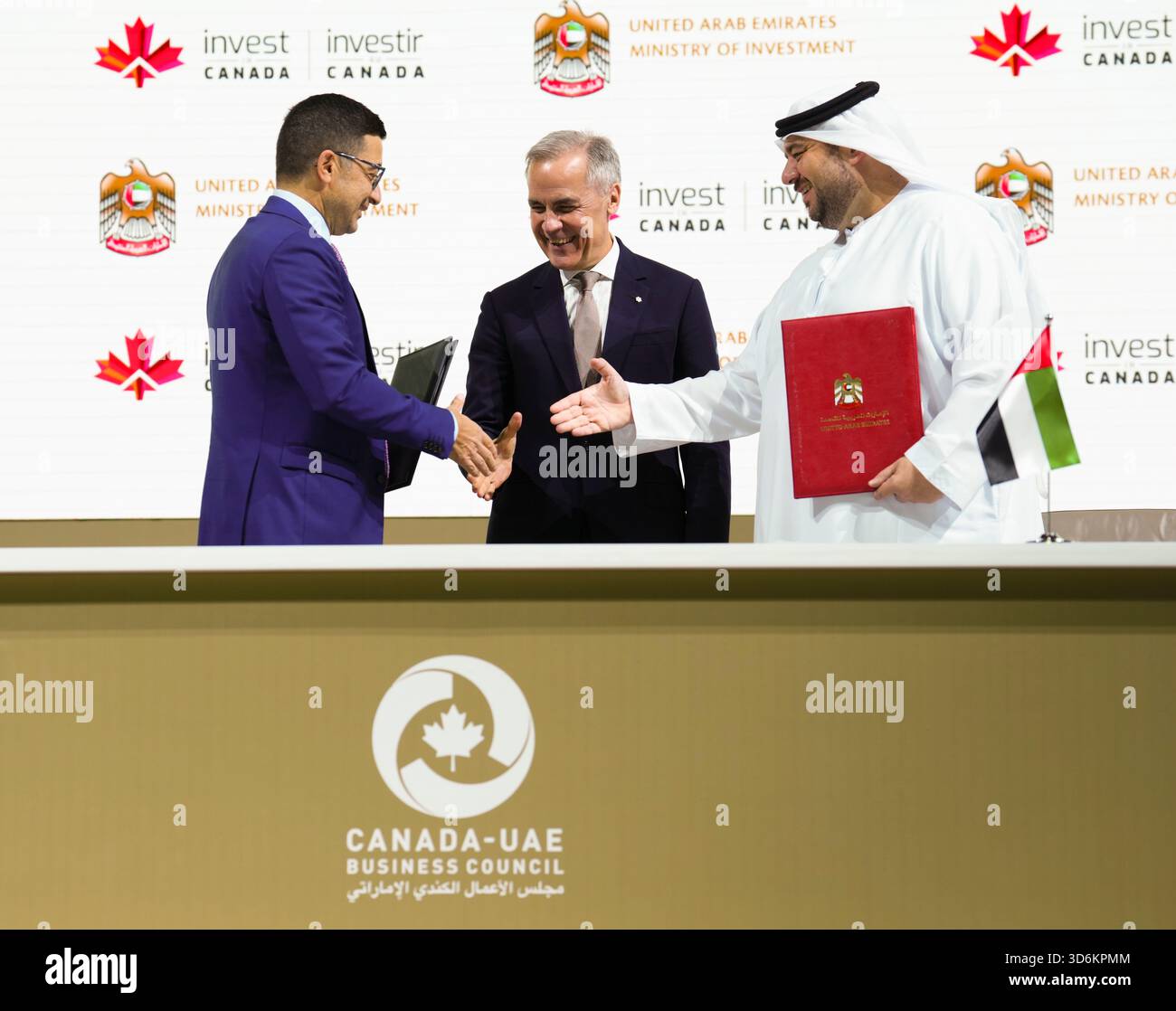 Prime Minister Mark Carney takes part in a signing ceremony during the ...