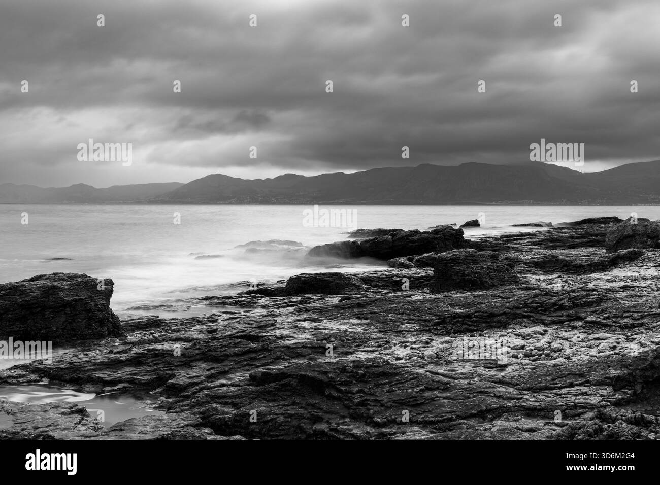 Rocky shoreline sea in Black and White Stock Photos & Images - Alamy