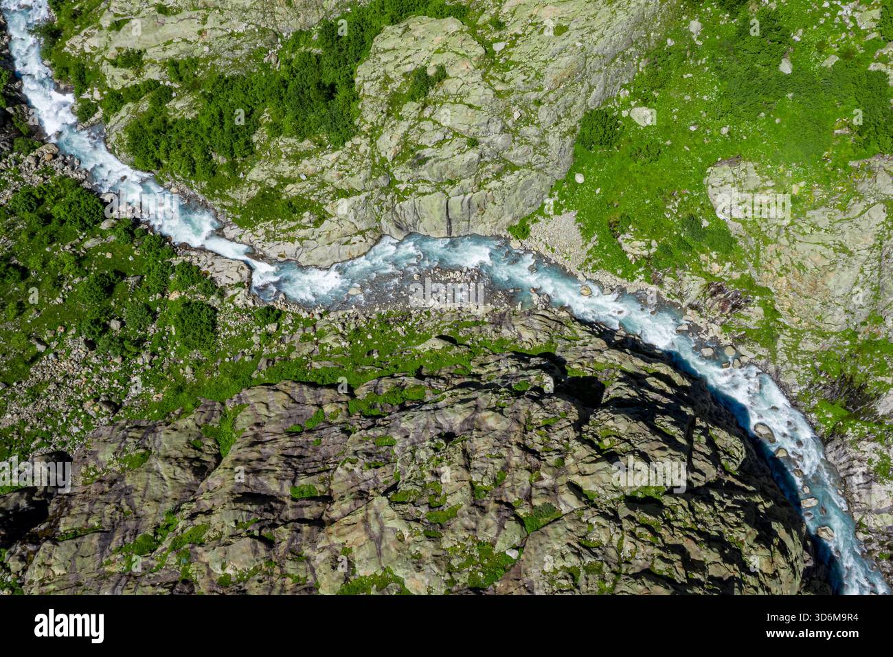 Aerial View of Turquoise Alpine River Carving a Rocky Gorge in the ...