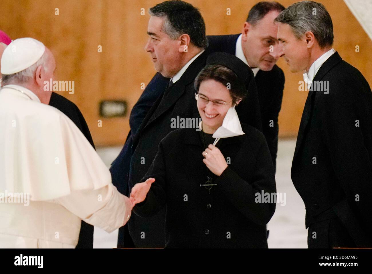 FILE - Pope Francis shakes hands with Sister Raffaella Petrini ...