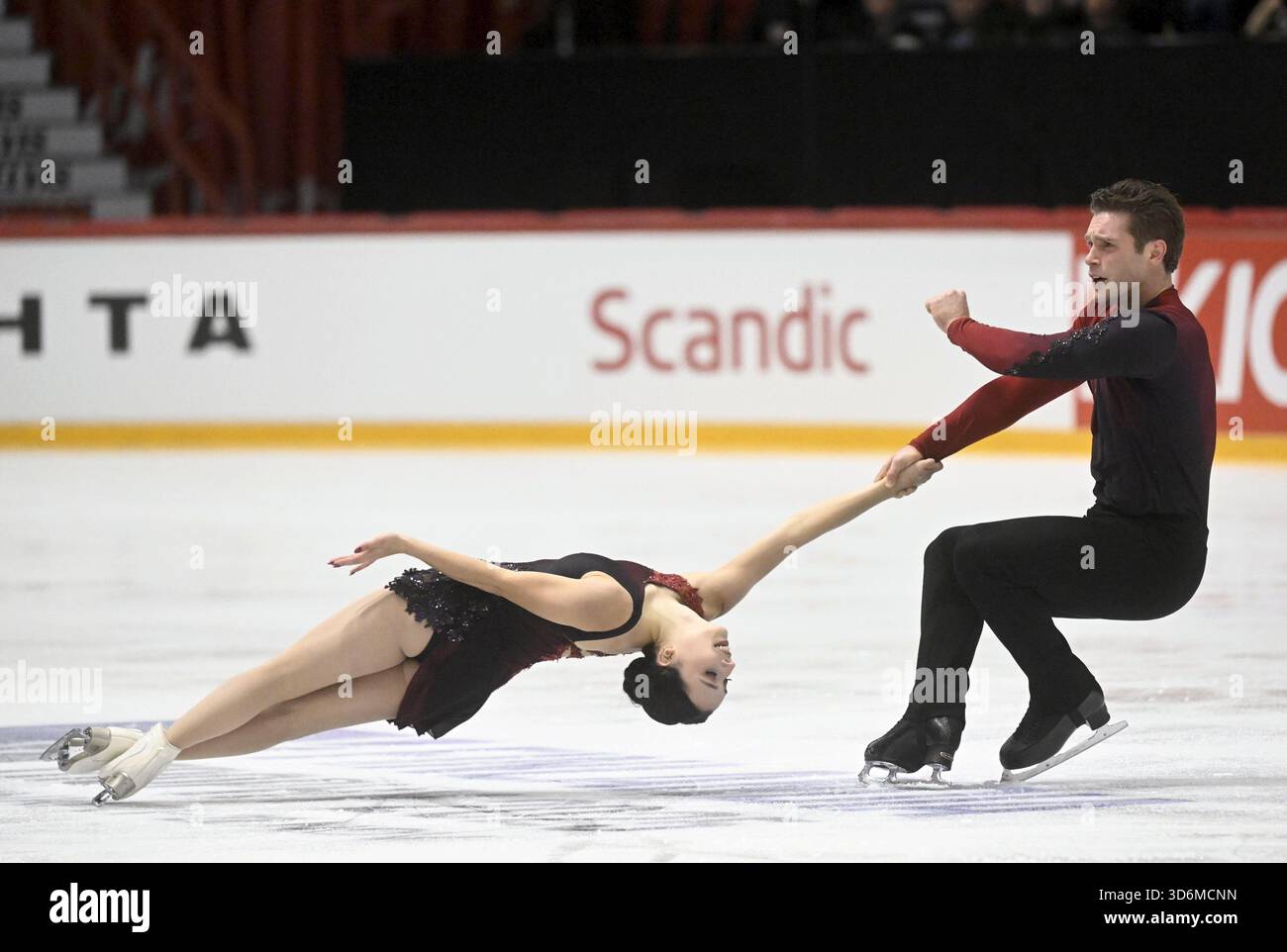 Lia Pereira and Trennt Michaud of Canada perform in Pairs Short Program ...