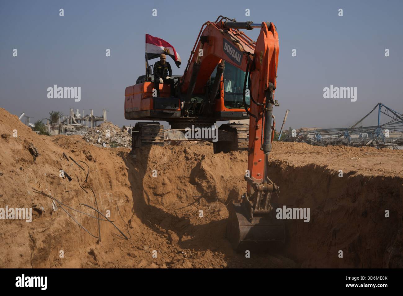 Islamic Jihad militants and Egyptian workers search for the bodies of ...