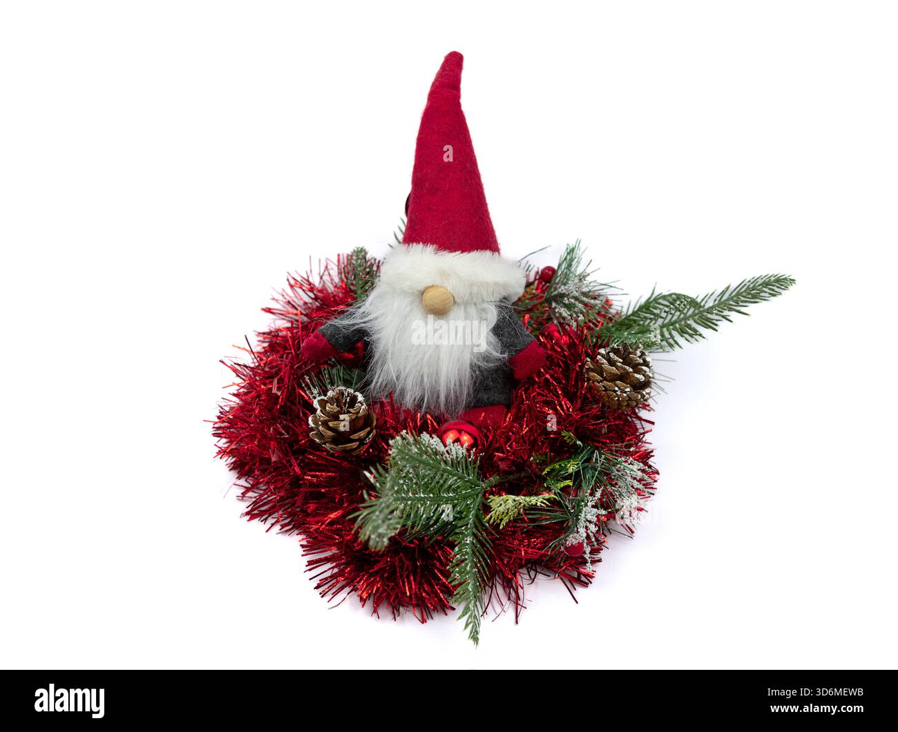 Cute Christmas gnome, featuring red hat and white beard, is nestled ...
