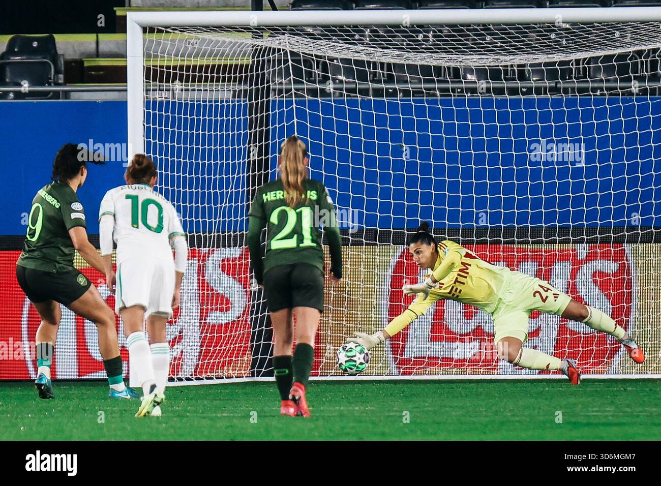Jada Conijnenberg (OH Leuven, #9) shoots the penalty while Rachele ...