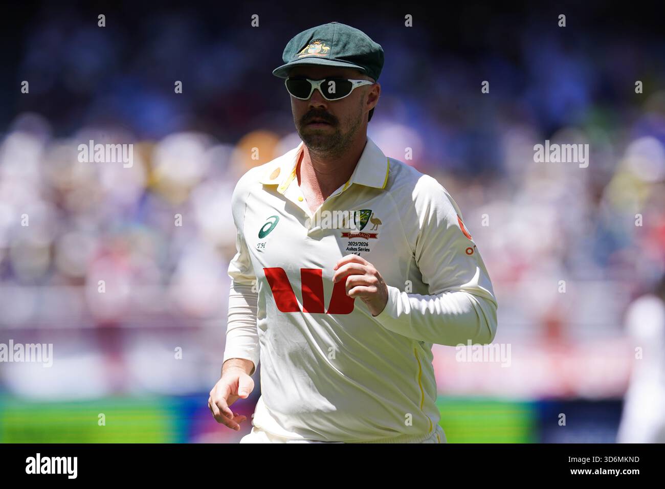 Australia's Travis Head moves into position on day one of the first ...