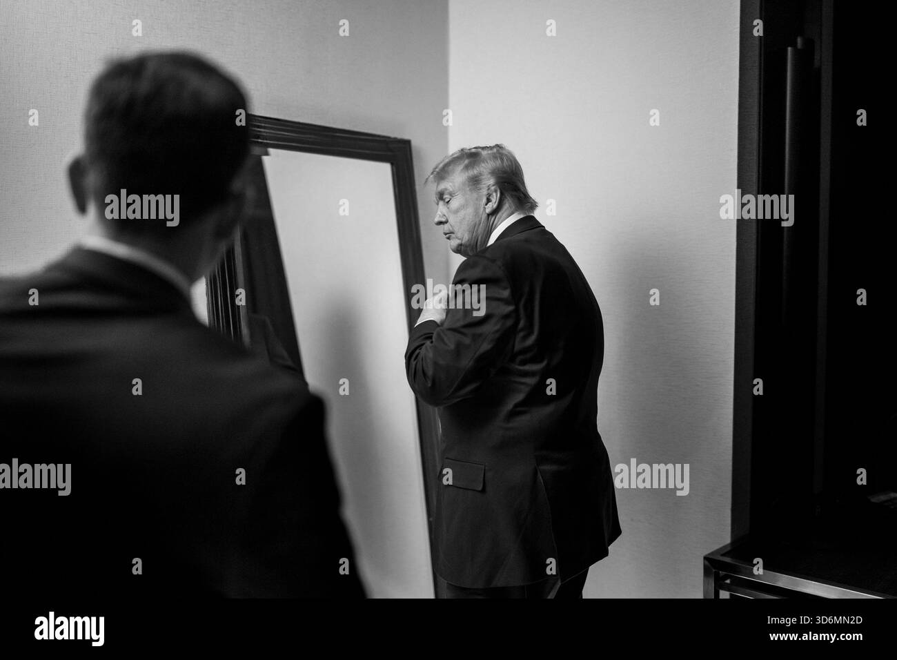 President Donald Trump prepares for his speech backstage at the ...