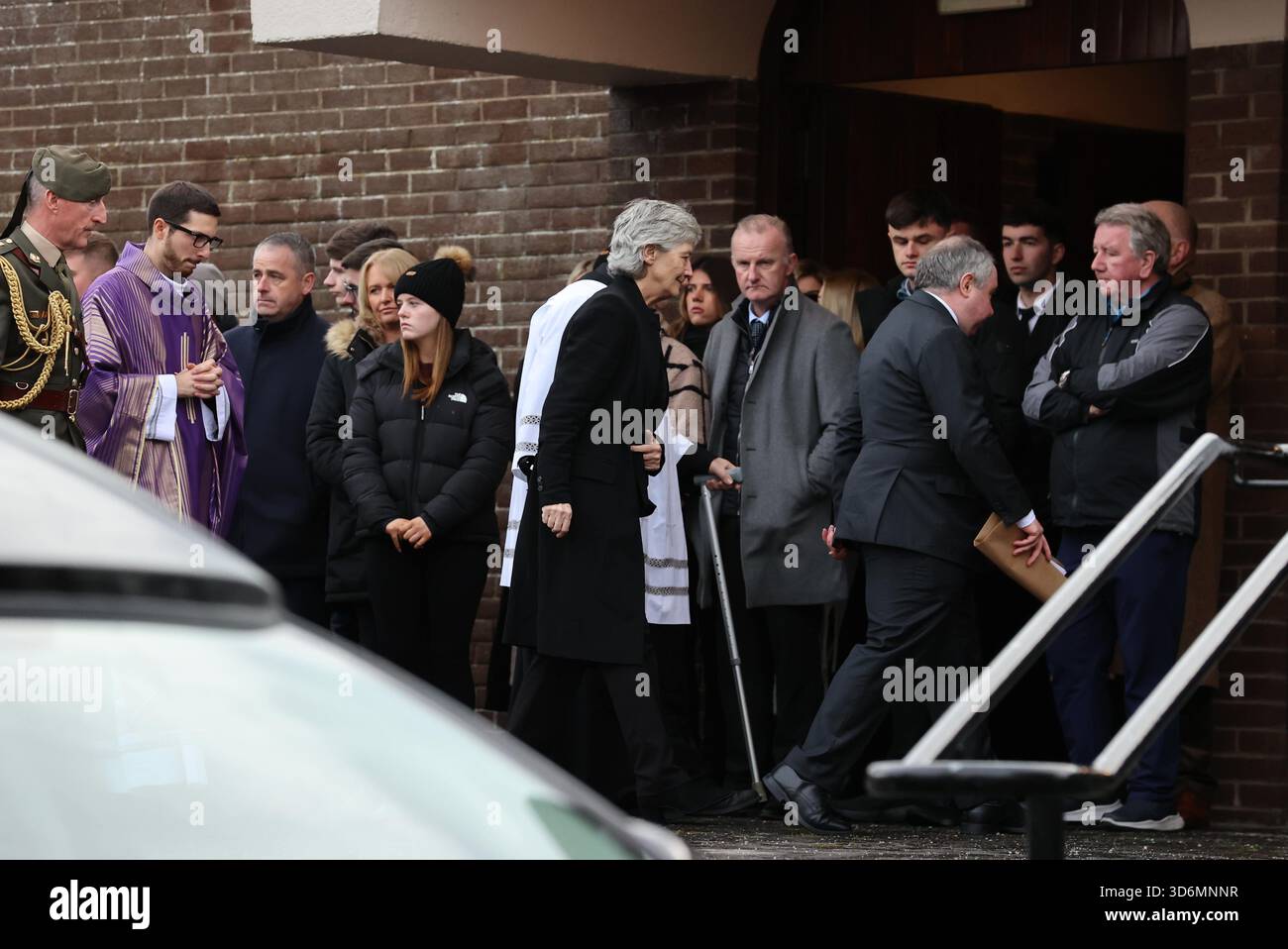 Irish President Catherine Connolly arrives for the funeral service of Dylan Commins, 23, from ...