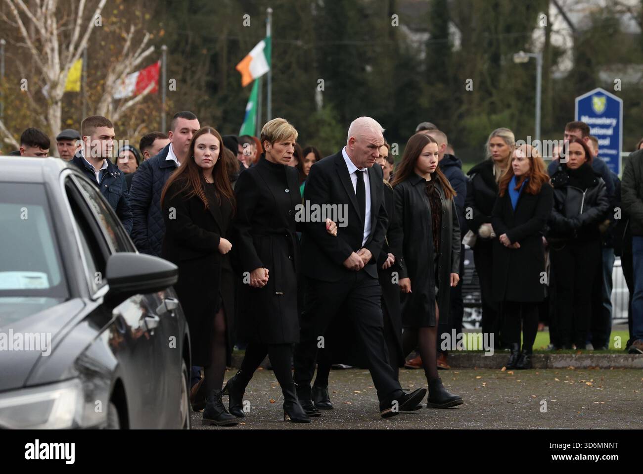 The family of Dylan Commins, 23, from Ardee in Co Louth, arrive arm-in-arm at the Church of the ...