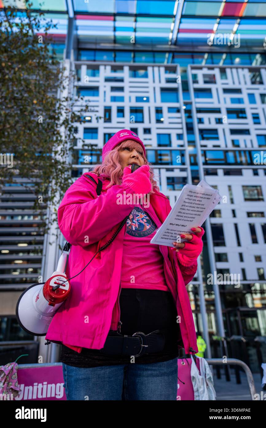 A Pink Lady seen outside the Home Office warns of the dangers posed to ...