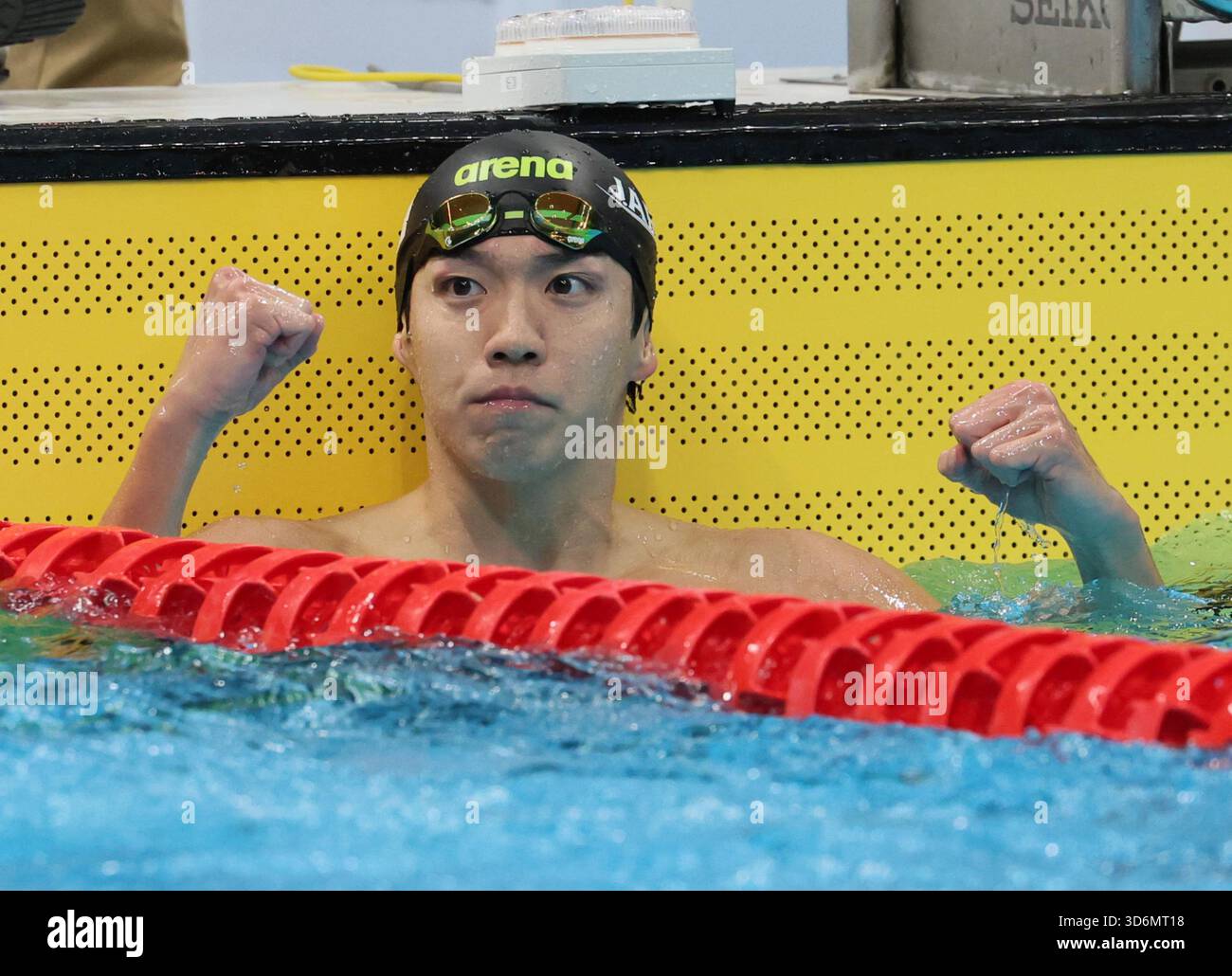 Ryutaro Ibara reacts after winning the men's 200m freestyle final match at Keio Arena Tokyo in ...