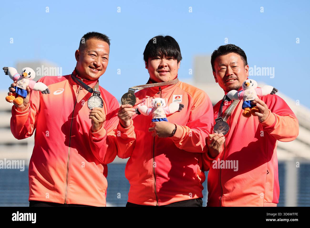(L-R) silver medalist Masatoshi Morimoto, gold medalist Riki Toyama ...