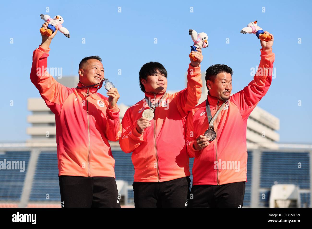 (L-R) silver medalist Masatoshi Morimoto, gold medalist Riki Toyama ...