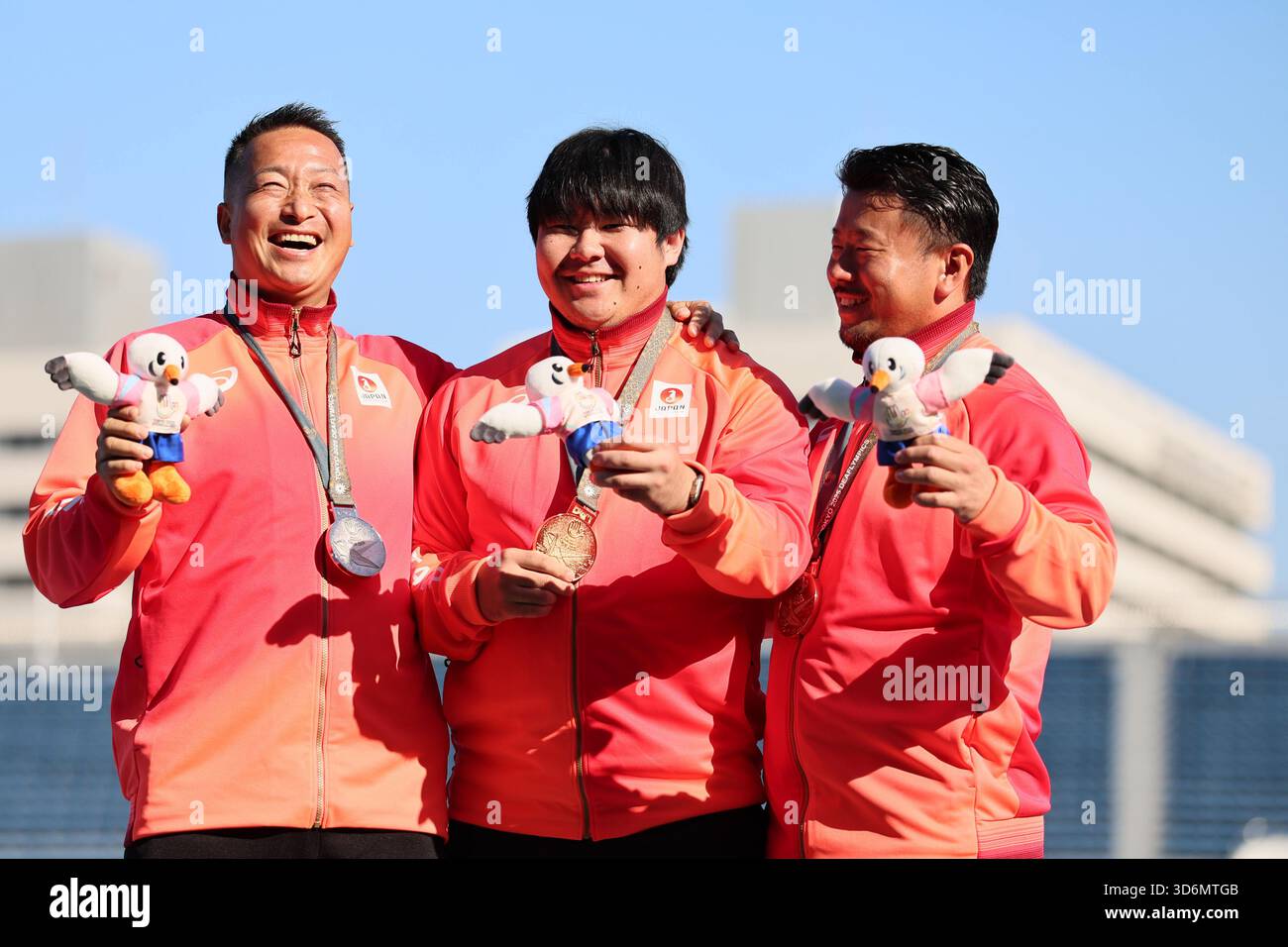 (L-R) silver medalist Masatoshi Morimoto, gold medalist Riki Toyama ...