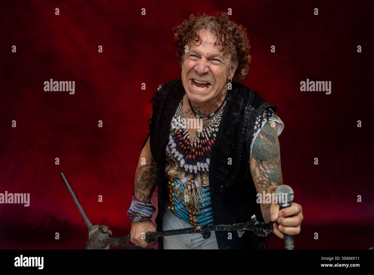 Singer Fructuoso "Fortu" Sanchez, from the band Obus', poses in front ...