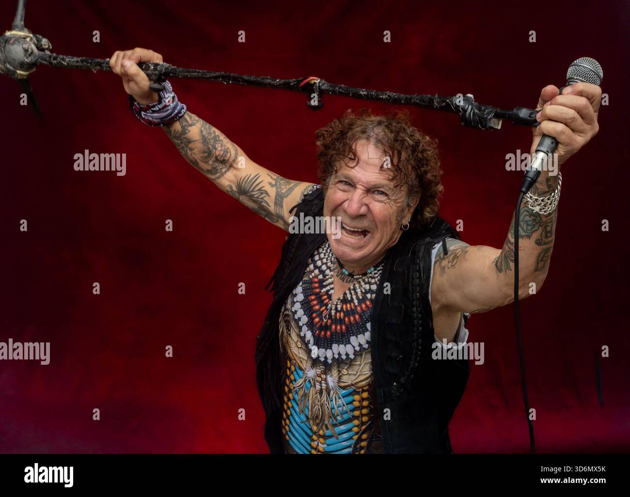 Singer Fructuoso "Fortu" Sanchez, from the band Obus', poses in front ...