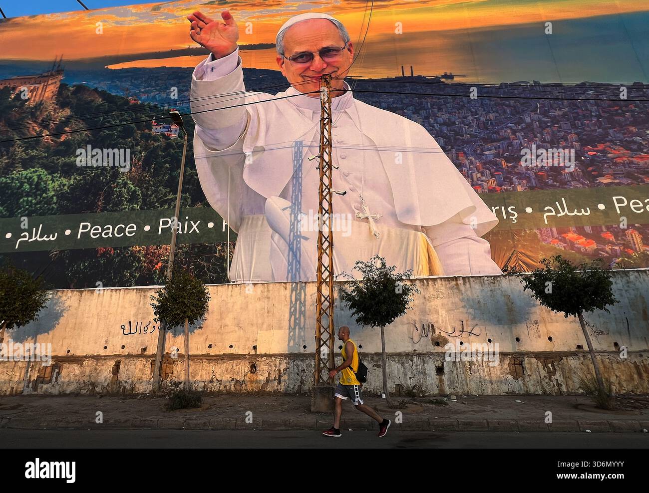 A billboard displays an image of Pope Leo XIV, ahead of his upcoming ...