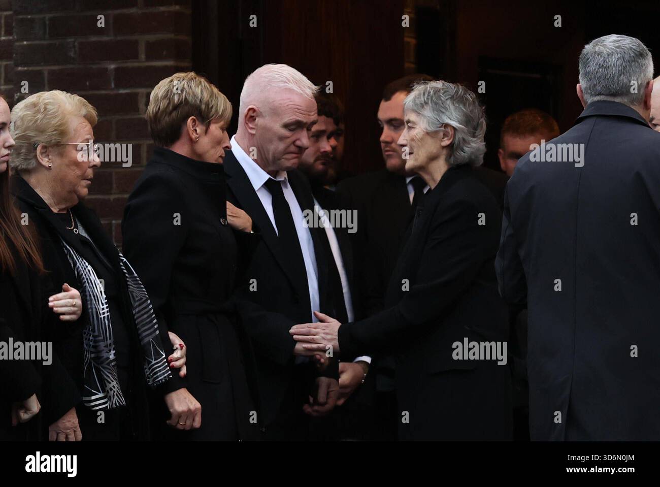 Irish President Catherine Connolly (right) offers her condolences to the family of Dylan Commins ...