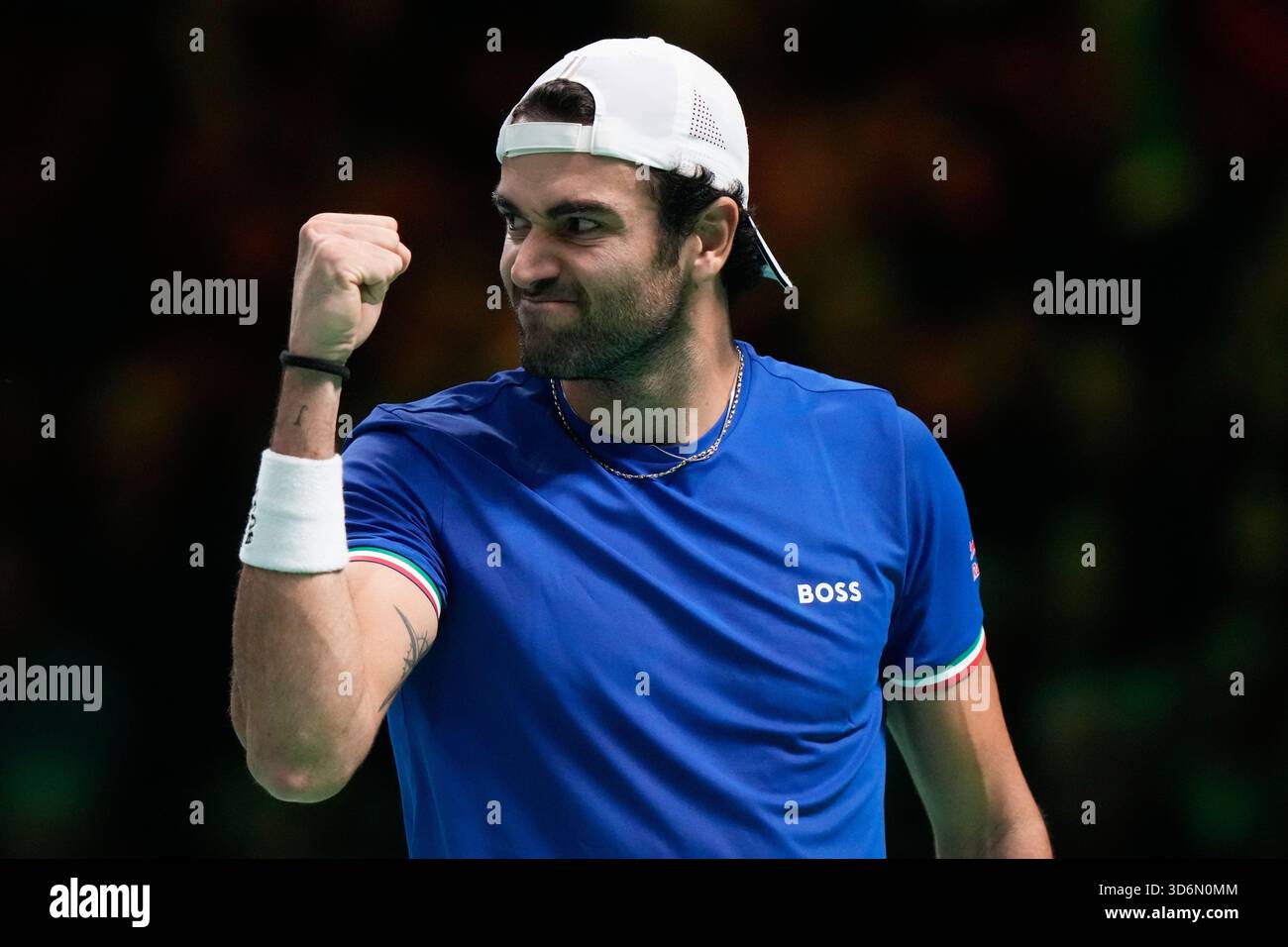 Italy's Matteo Berrettini reacts after winning a point to Belgium's ...