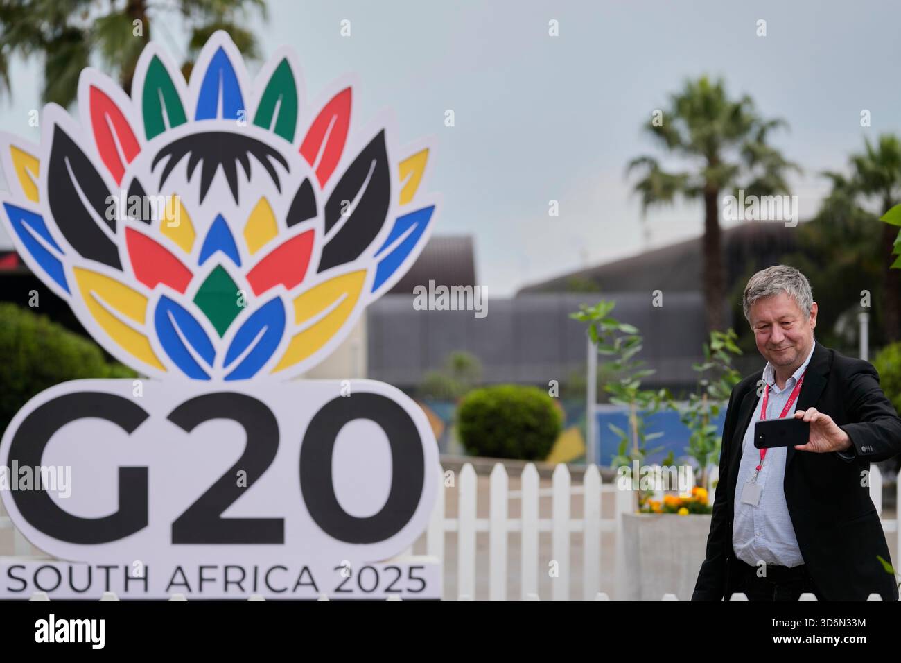 A journalist takes a selfie outside the media centre of the G20 Summit ...