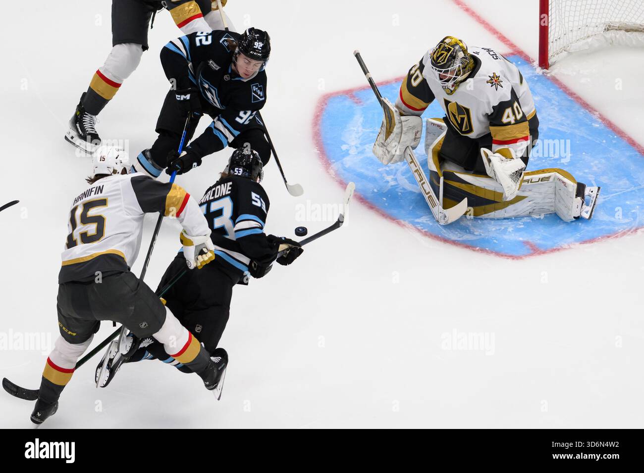 Utah Mammoth left wing Michael Carcone (53) shoots the puck as he is ...