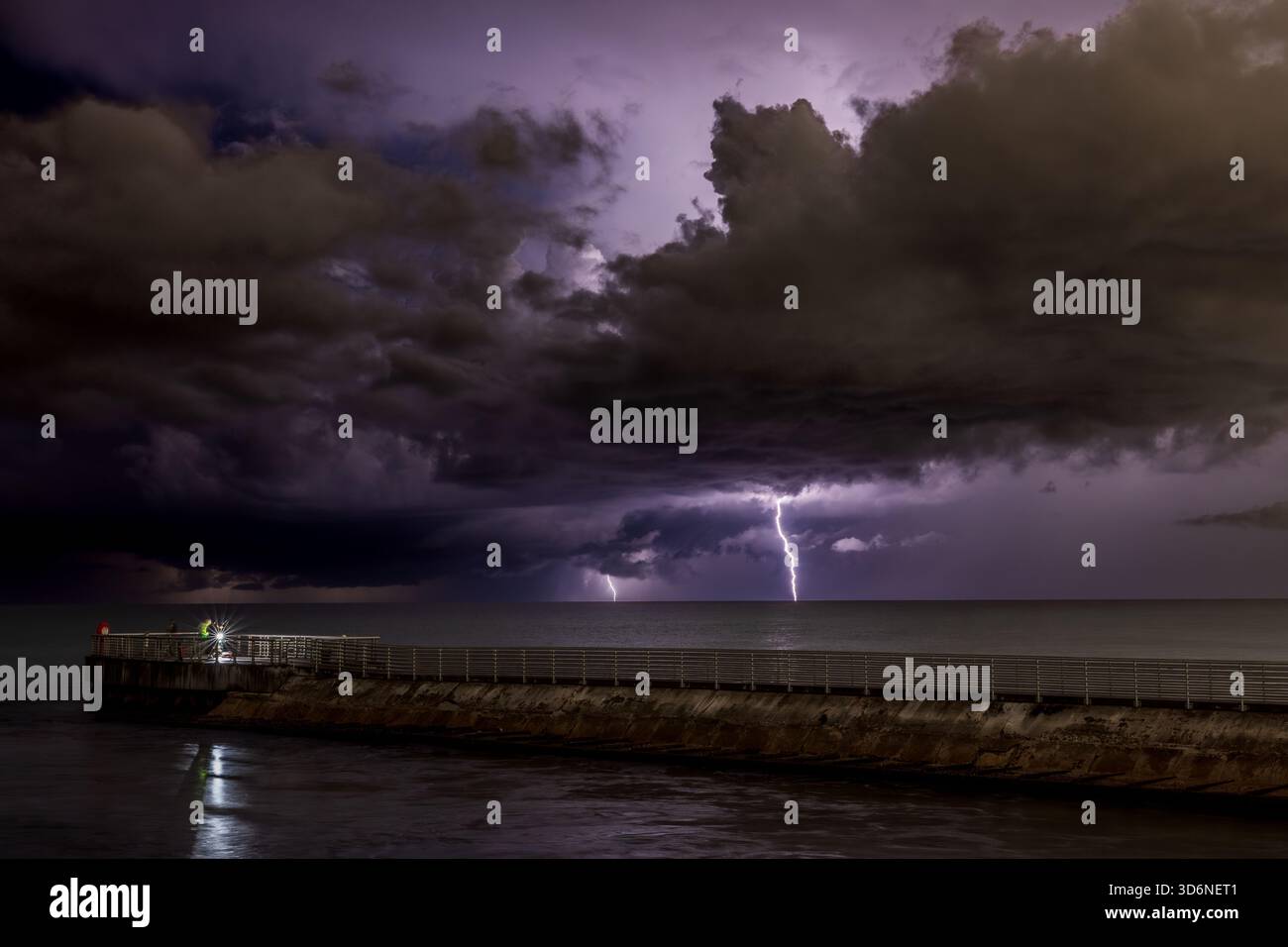 Tropical Lightning Storm in the Ocean over a Fishing Pier Stock Photo ...
