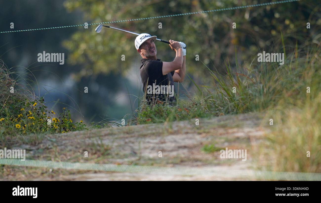 Scott Piercy hits from the waste area off the first fairway during the ...