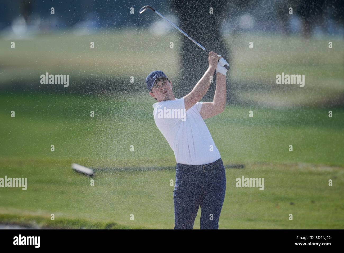Davis Thompson hits from a bunker on the first hole during the second ...