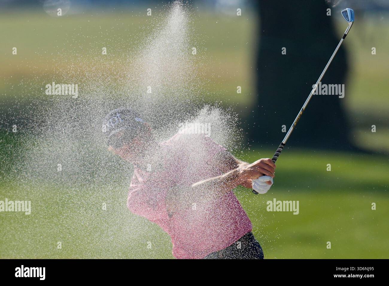 Adam Schenk hits from a bunker on the first hole during the second ...