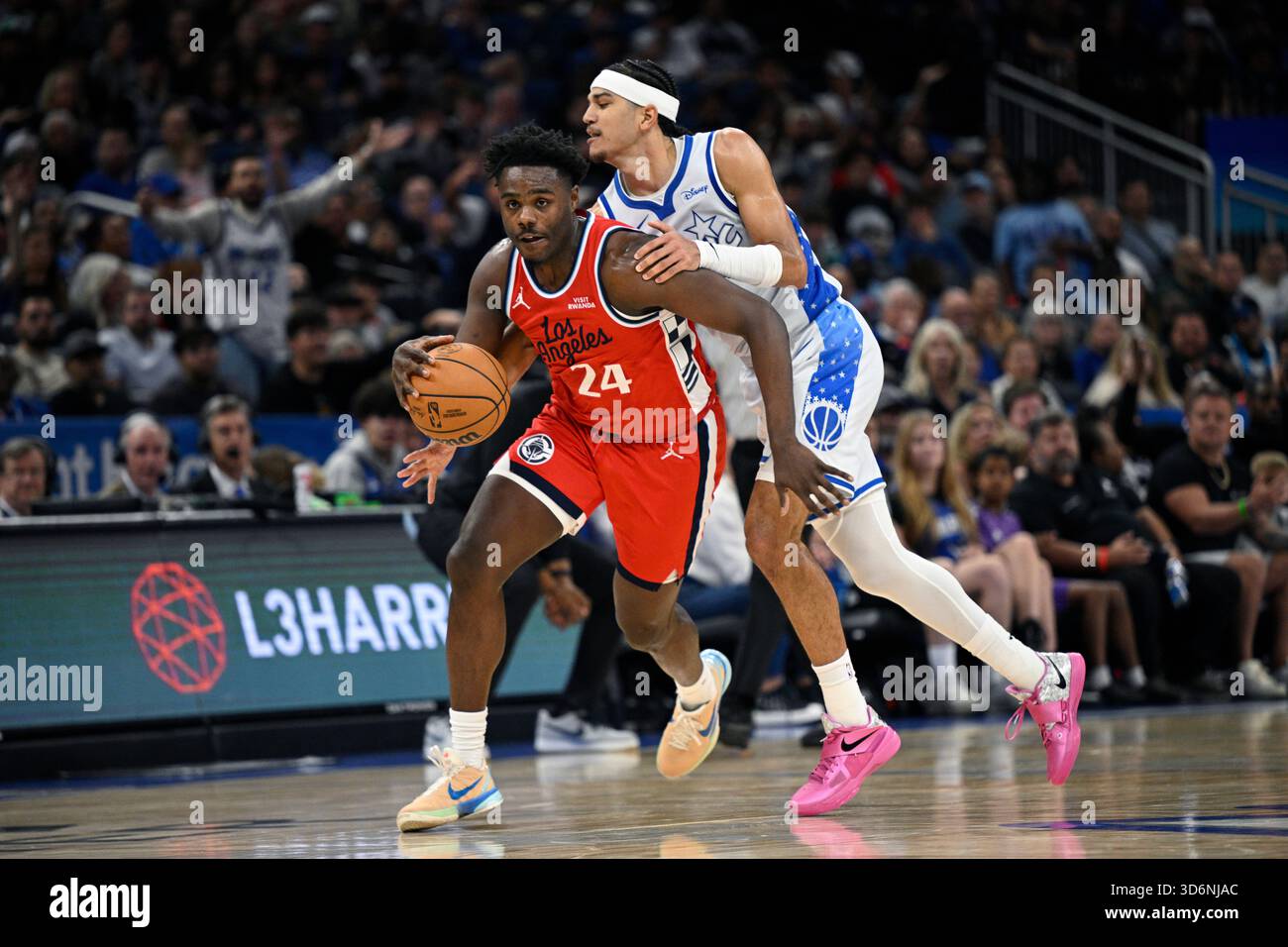 Los Angeles Clippers guard Kobe Brown (24) drives past Orlando Magic ...