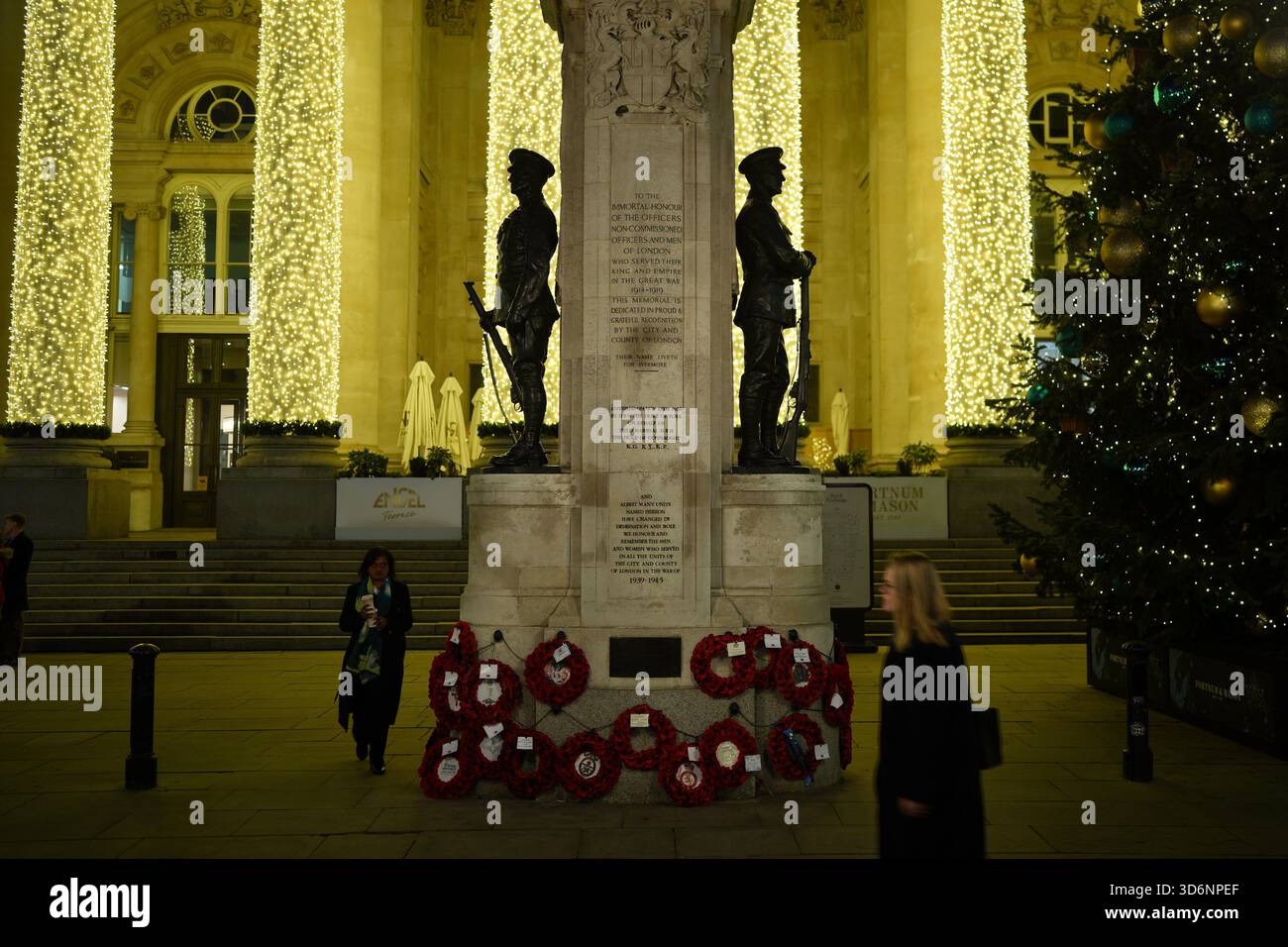 Christmas lights are displayed on the Royal Exchange building, behind ...