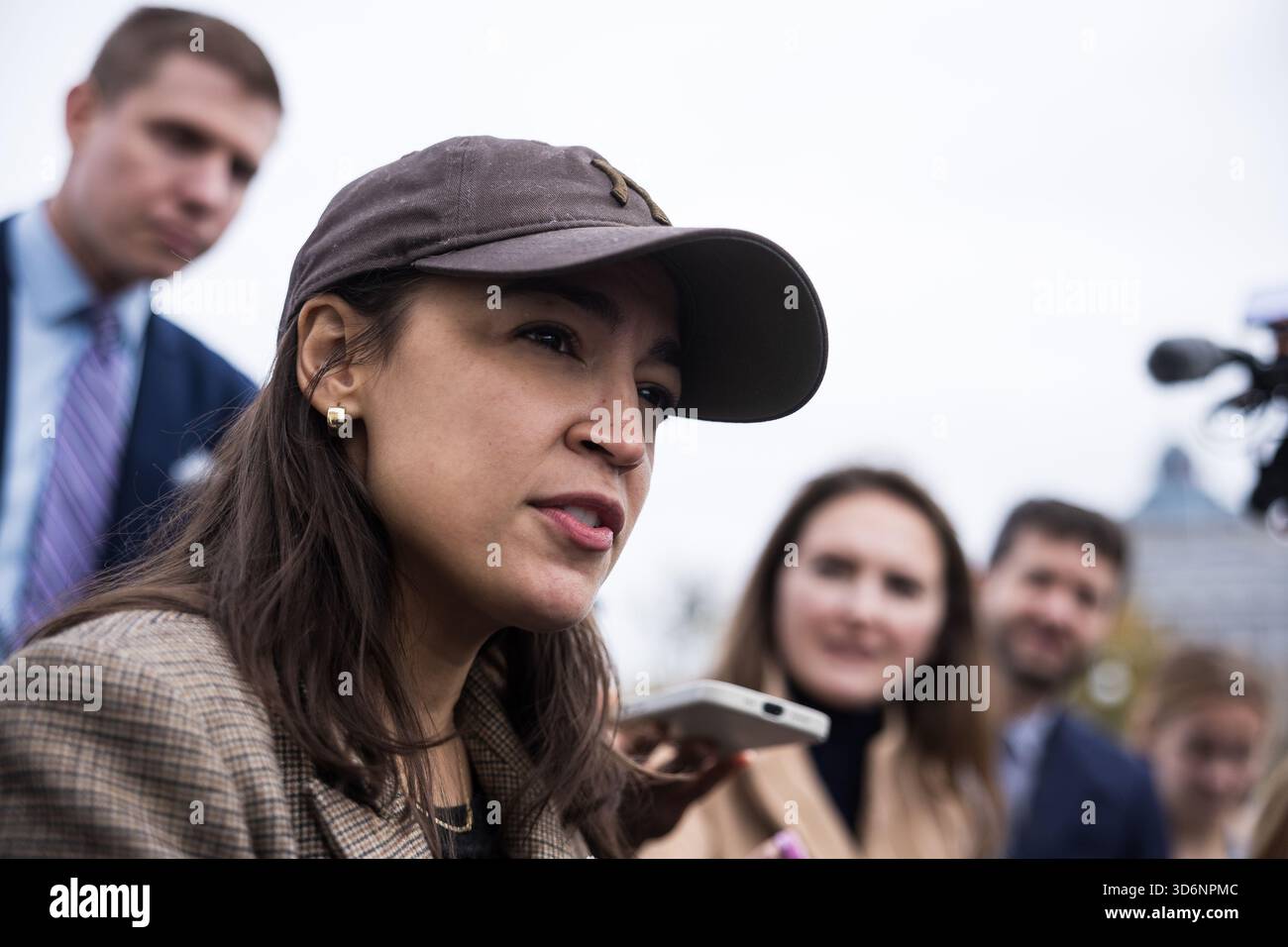 Rep. Alexandria Ocasio-Cortez (D-N.Y.) speaks with reporters as she ...