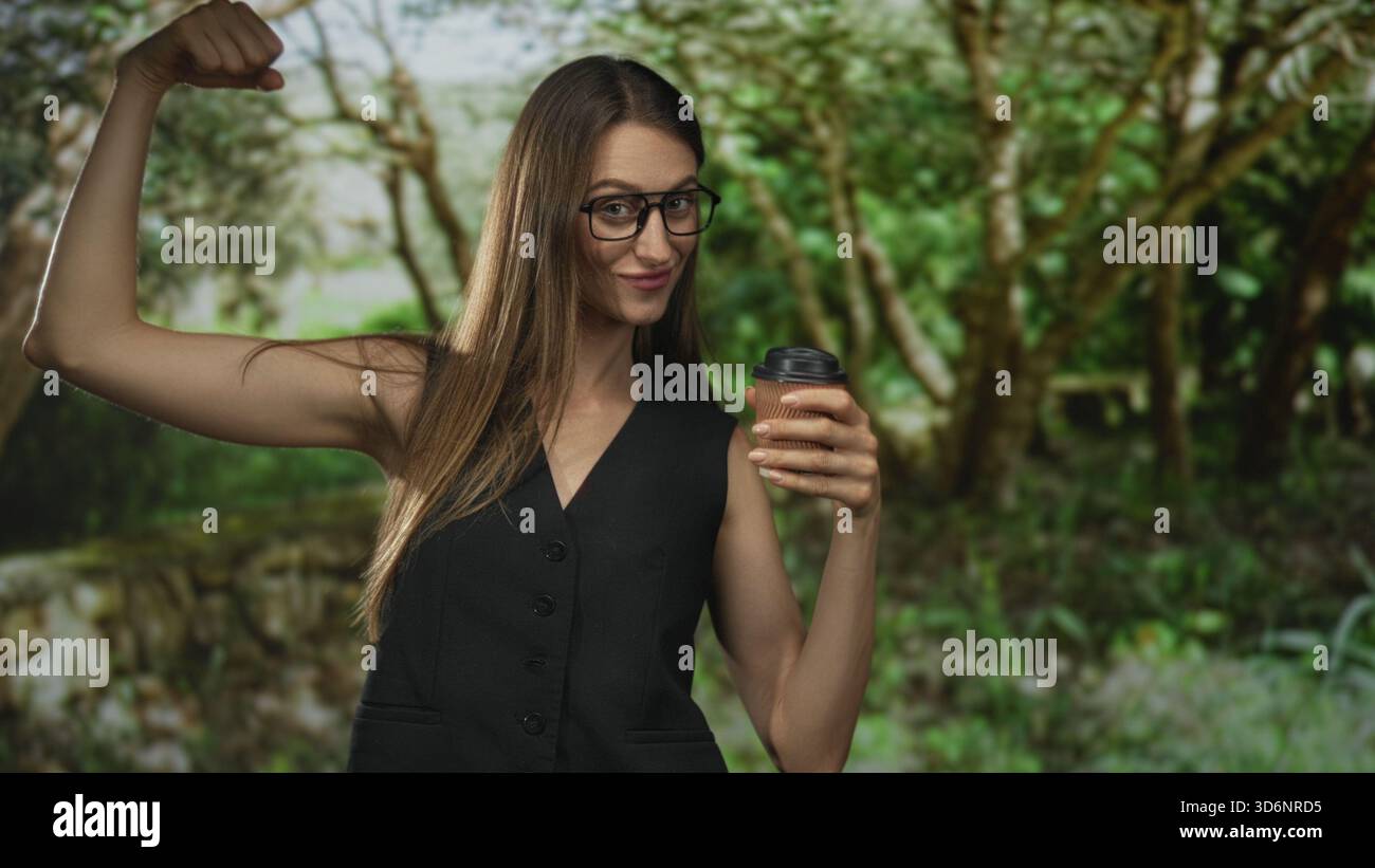 Woman flexes left arm hi-res stock photography and images - Alamy