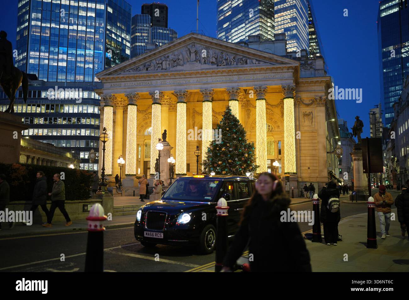 Christmas lights are displayed on the Royal Exchange building, in ...