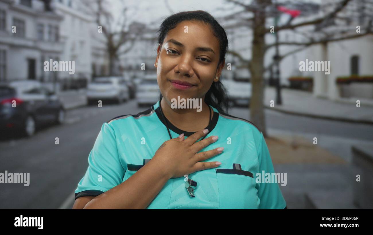 Female referee wearing turquoise uniform hi-res stock photography and ...