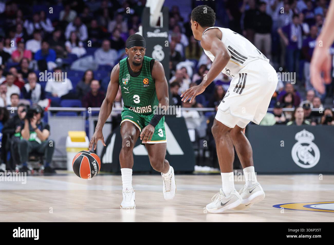 Sylvain Francisco of Zalgiris Kaunas and Theo Maledon of Real Madrid ...