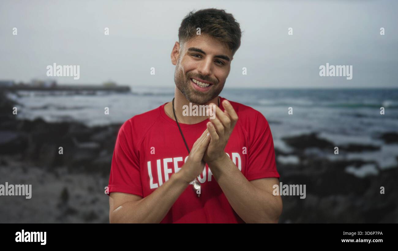 Hispanic lifeguard man claps hi-res stock photography and images - Alamy