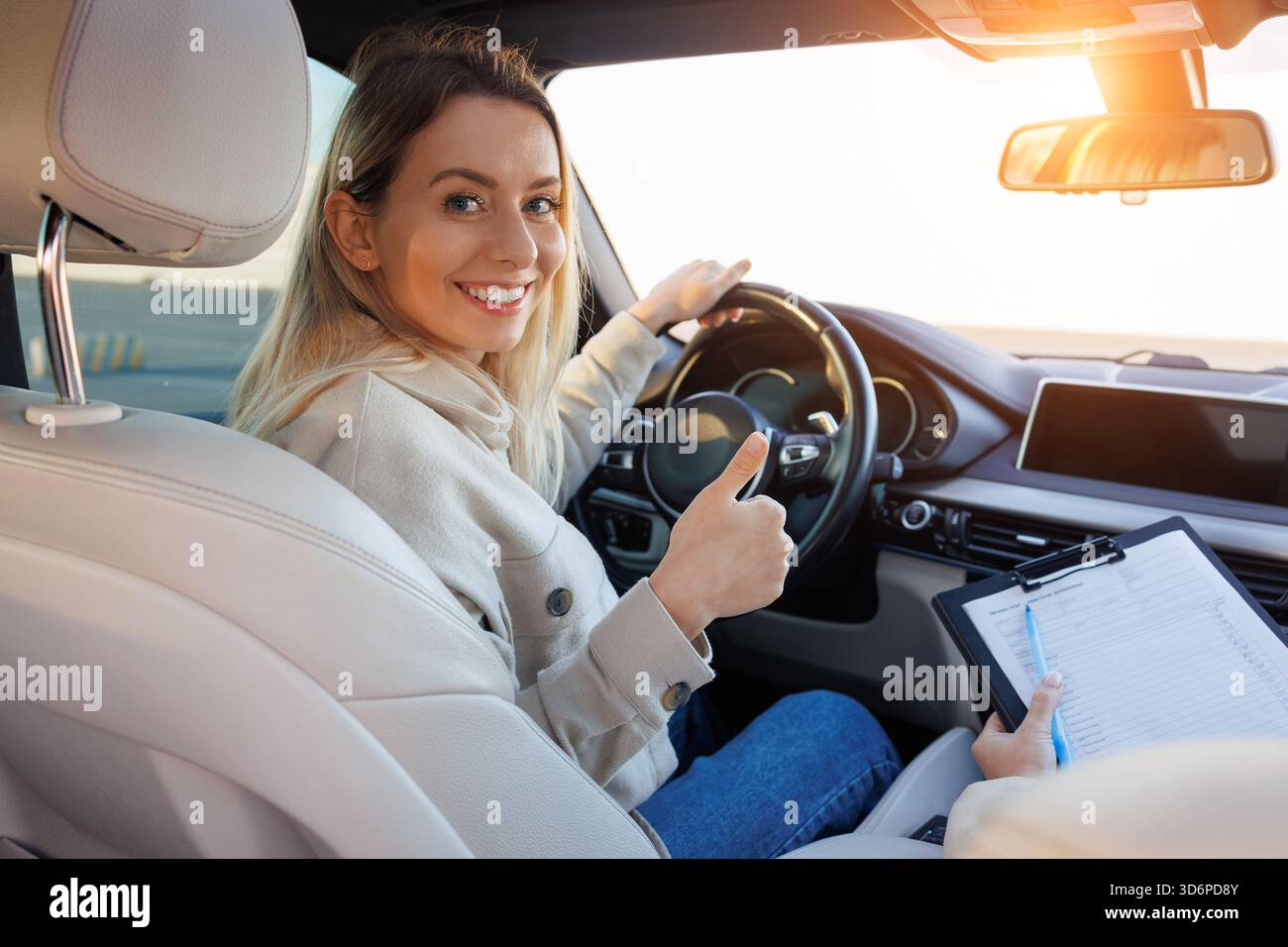 Happy Learner Driver Giving Thumbs Up During Driving Lesson Stock Photo ...