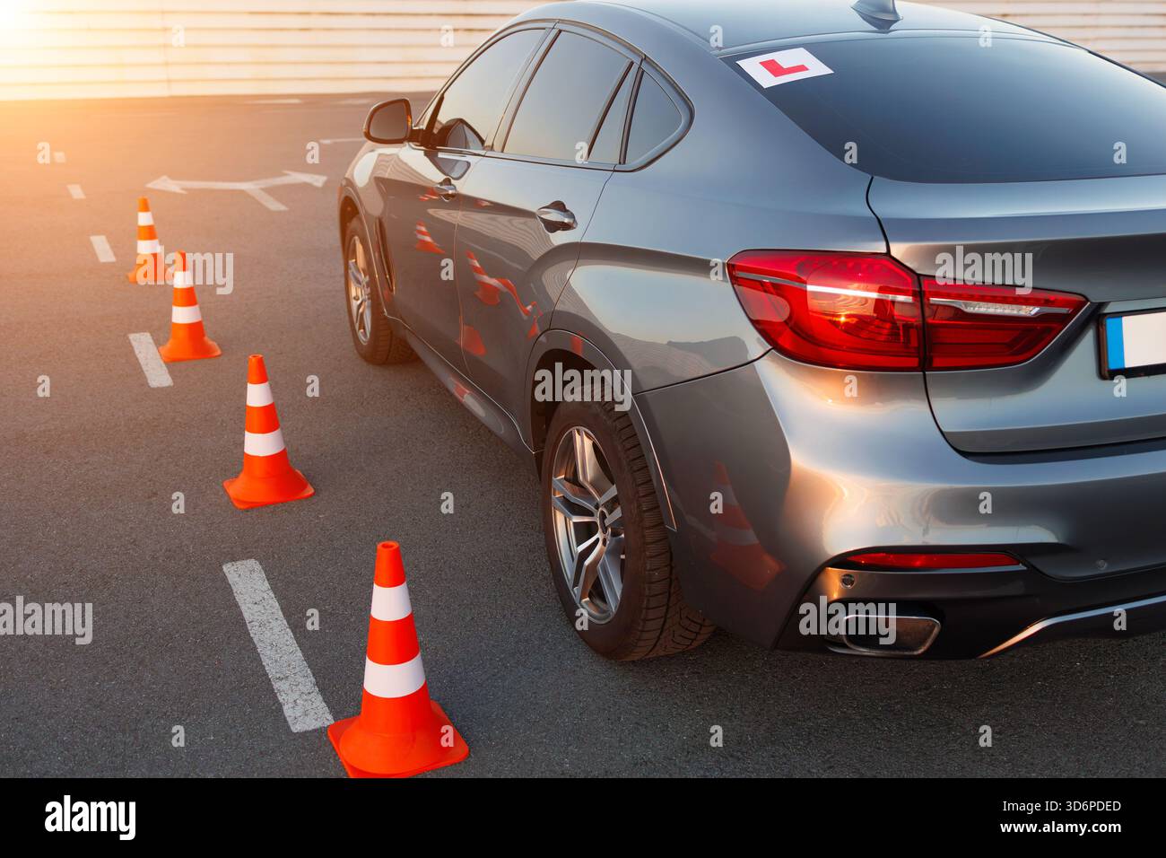 Learner Vehicle Maneuvering Between Safety Cones on Driving Test Area ...