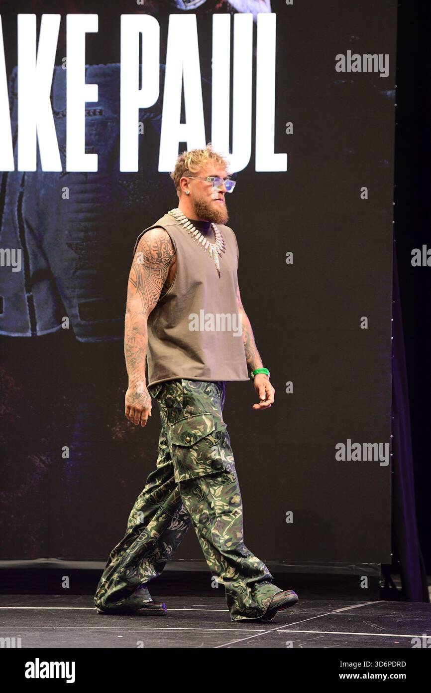 Jake Paul walks on stage during the press conference for the upcoming ...