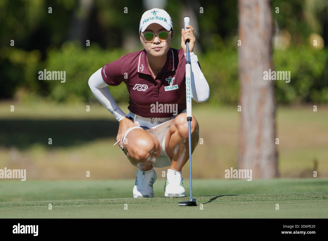 Minjee Lee of Australia looks at her shot on the first green during the ...