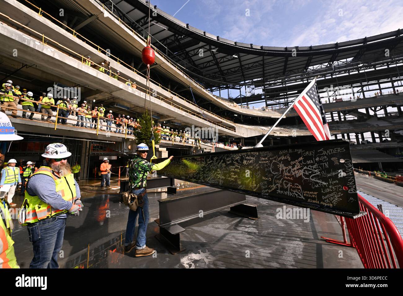A steel beam filled with signatures of construction workers ...
