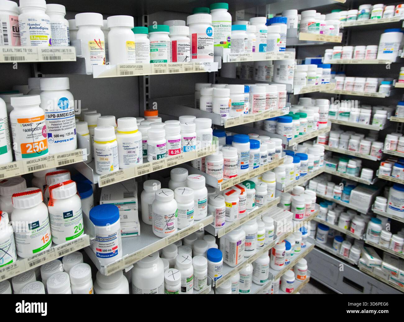 Prescription drugs are seen on shelves at a pharmacy in Montreal on ...