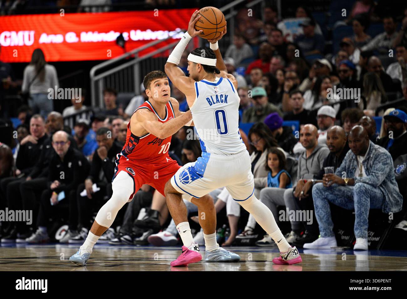 Orlando Magic guard Anthony Black (0) is defended by Los Angeles ...