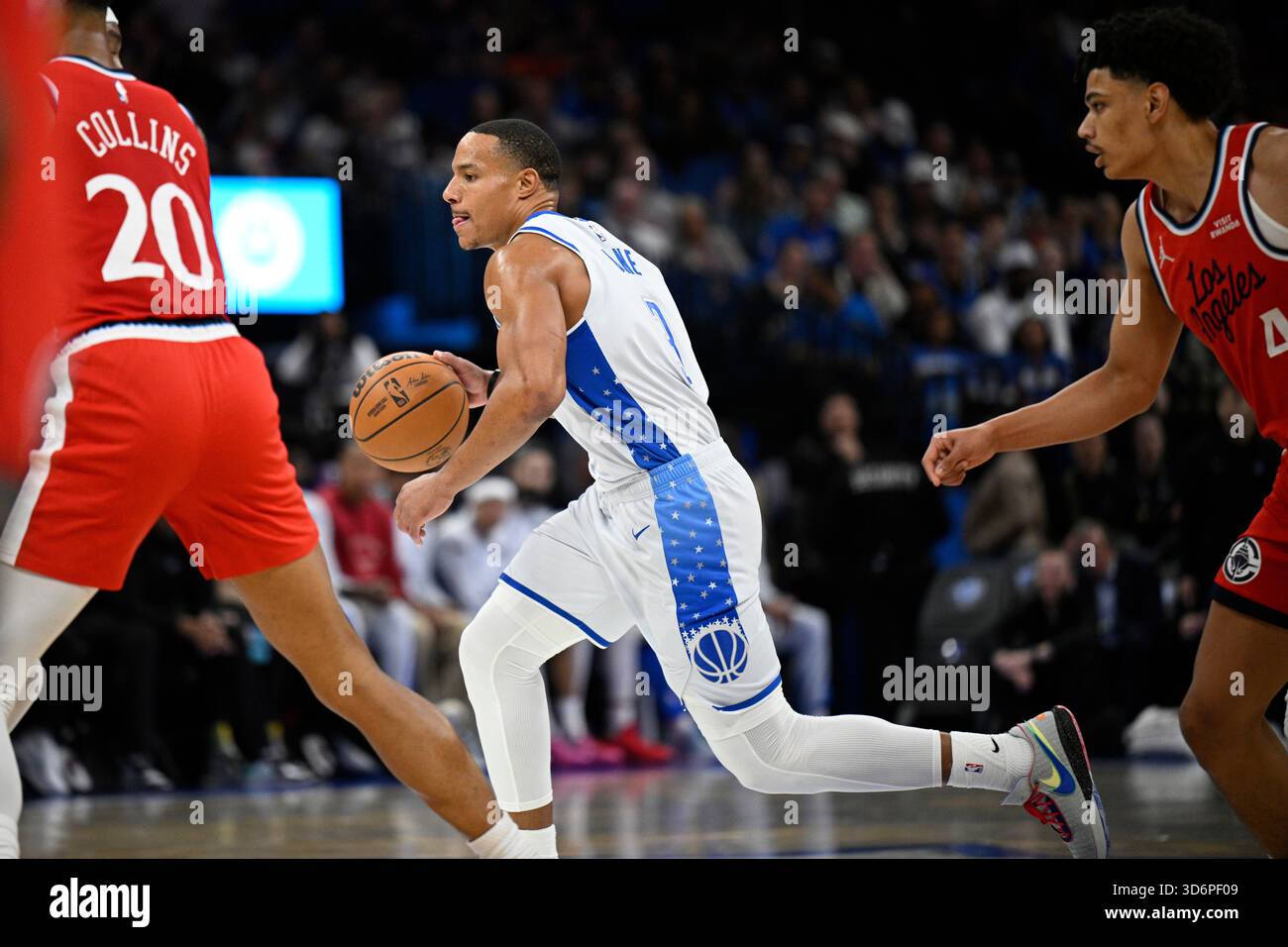 Orlando Magic guard Desmond Bane (3) drives between Los Angeles ...