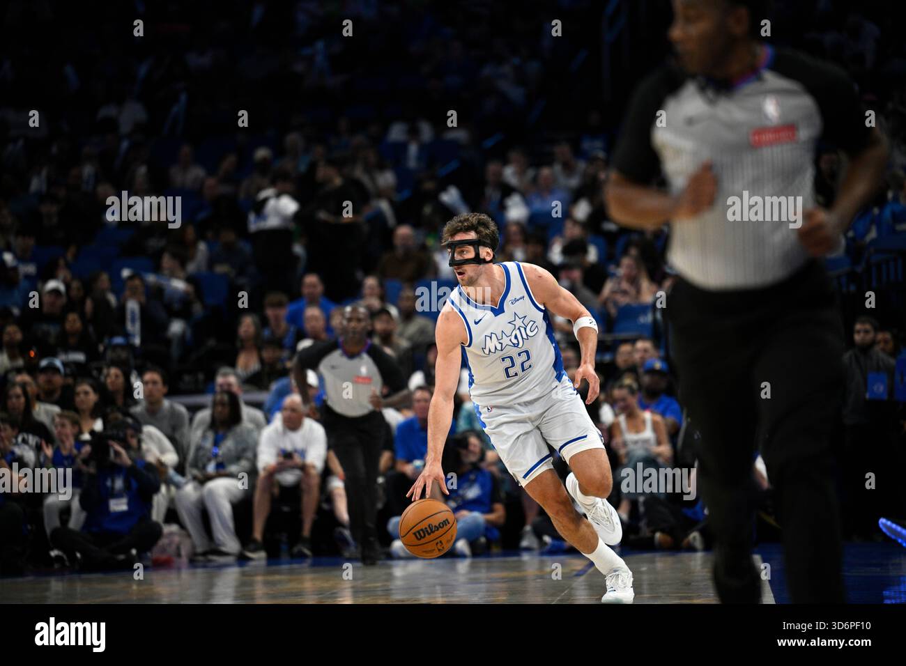 Orlando Magic forward Franz Wagner (22) brings the ball up the court against the Los Angeles ...