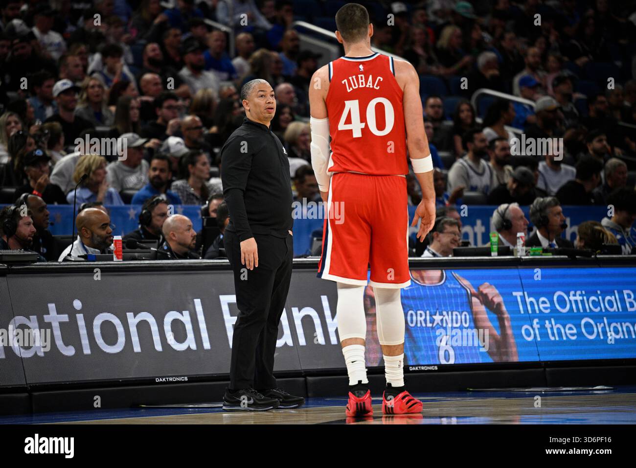Los Angeles Clippers head coach Tyronn Lue, left, talks with center ...