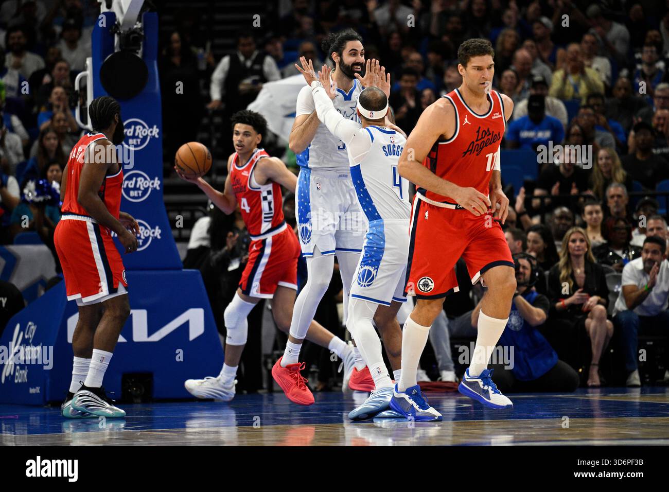 Orlando Magic center Goga Bitadze celebrates his score with guard Jalen ...