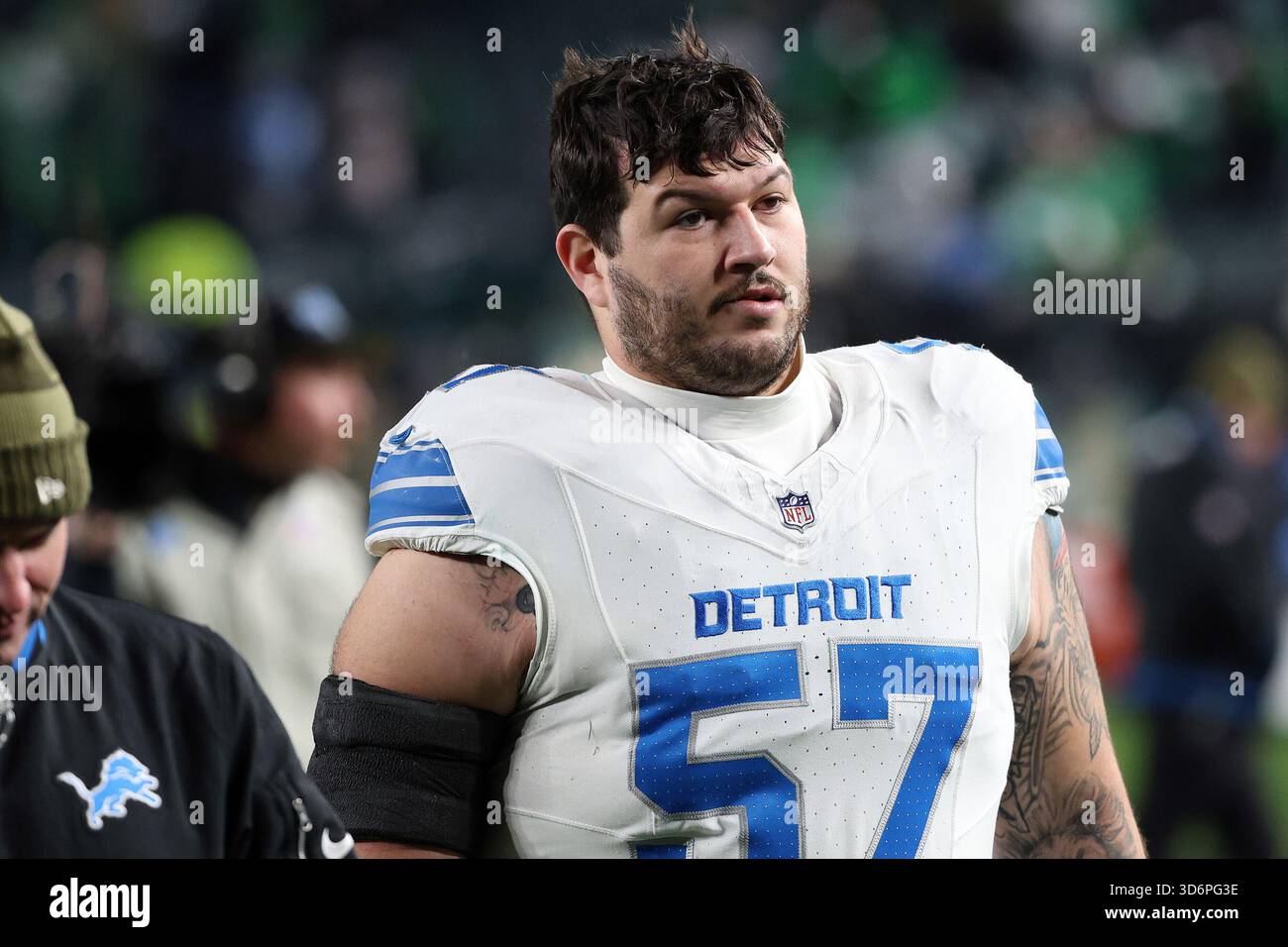 Detroit Lions offensive lineman Trystan Colon (57) looks on after an ...