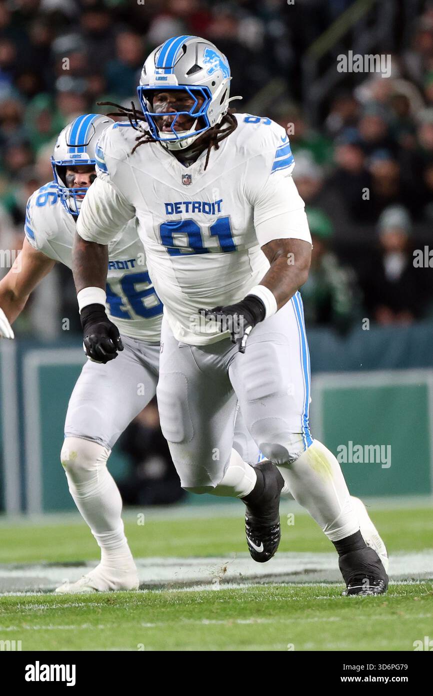 Detroit Lions defensive tackle Tyleik Williams (91) rushes during an ...