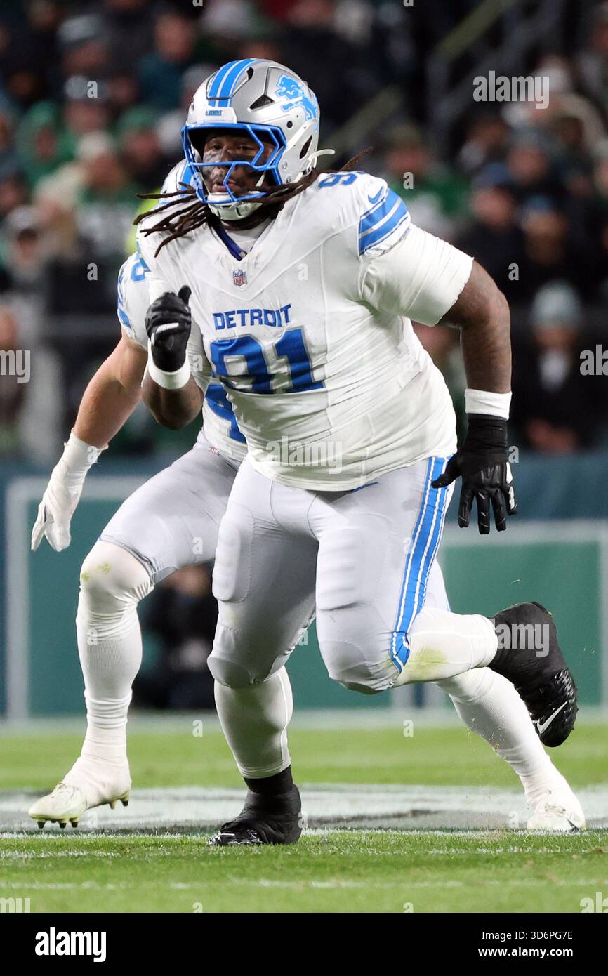 Detroit Lions defensive tackle Tyleik Williams (91) rushes during an ...